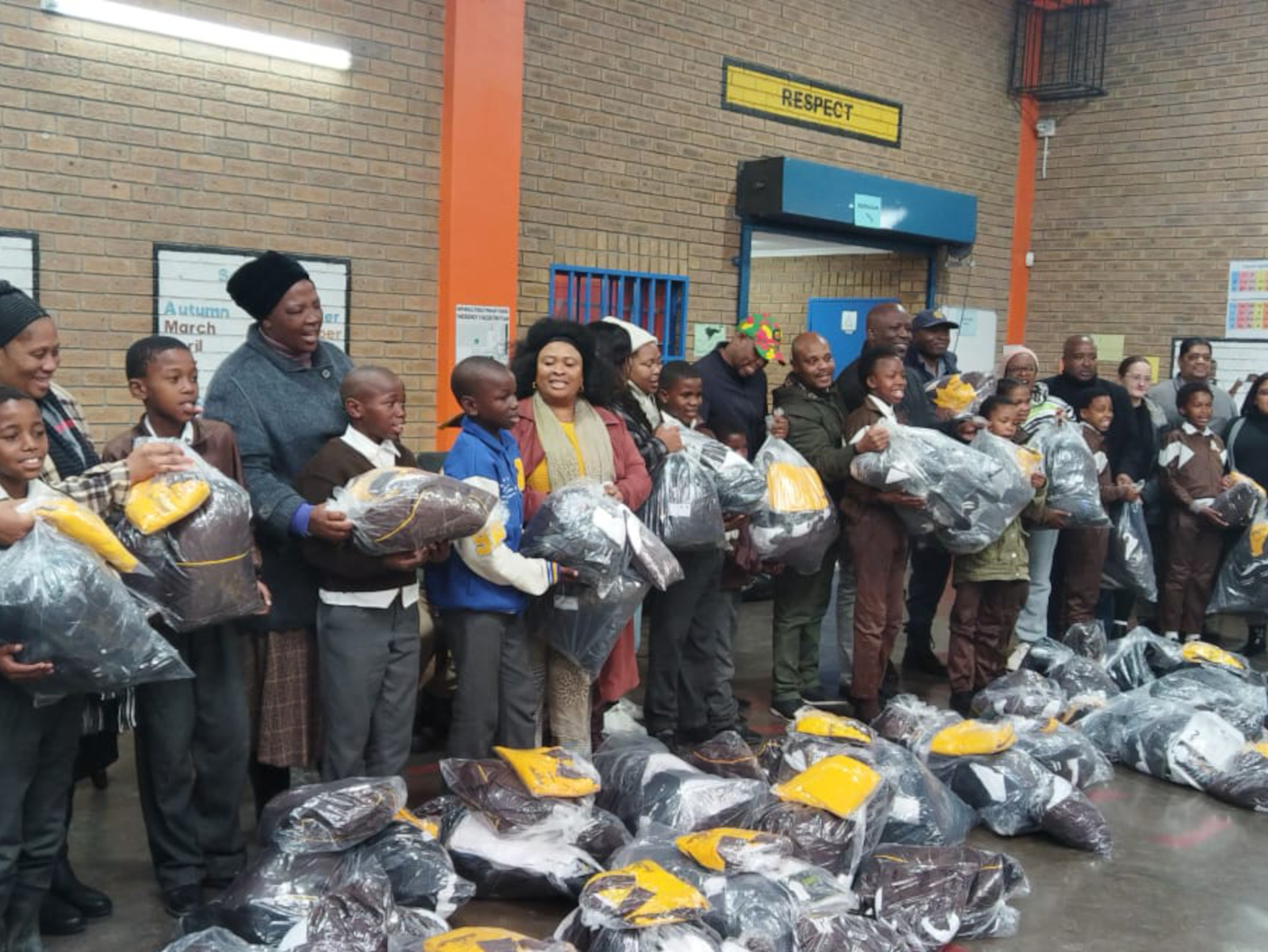 Sassa makes poor kids happy with new school uniforms - Scrolla.Africa