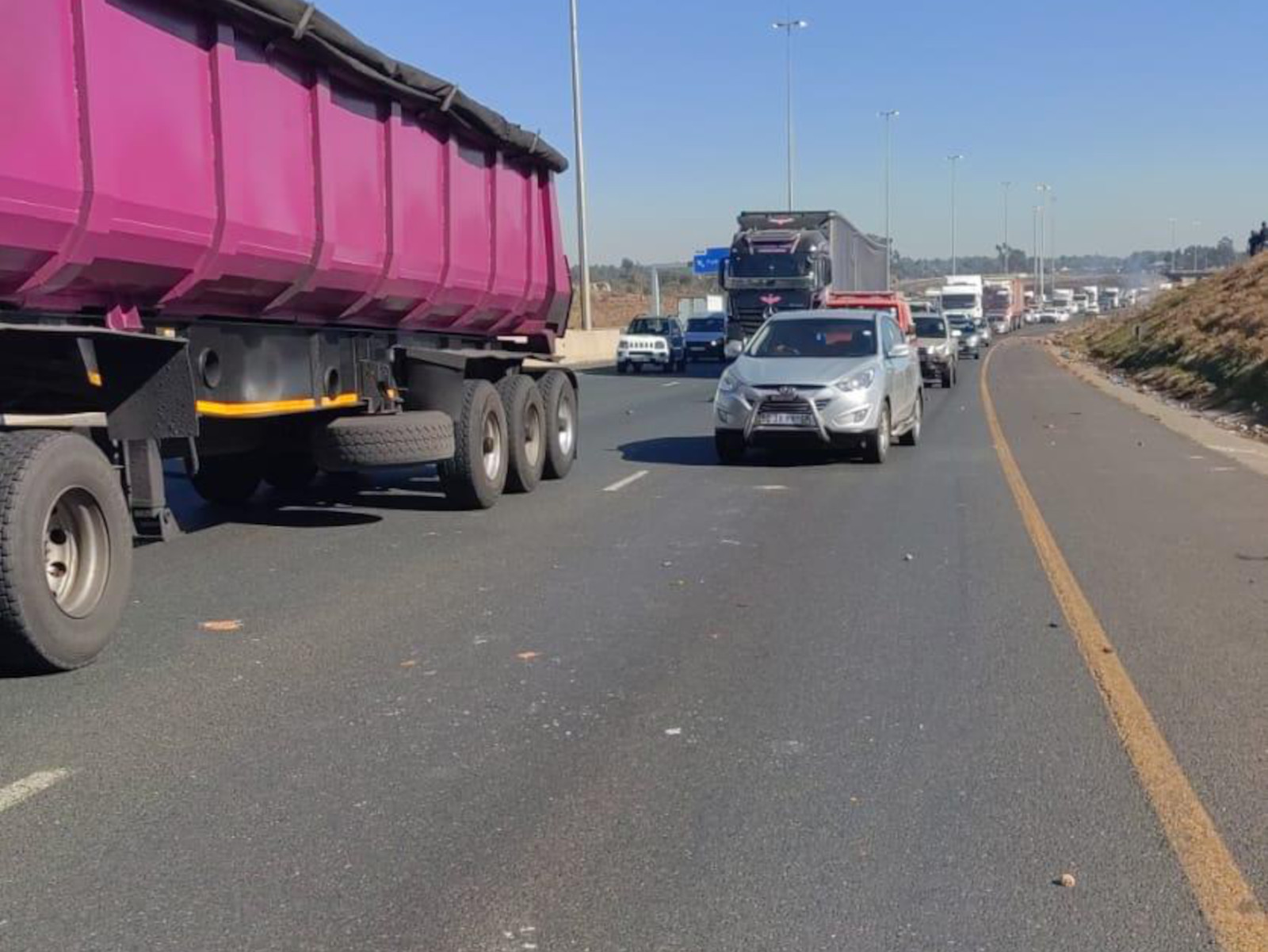 Protesters bring highway to a standstill over power cuts - Scrolla.Africa