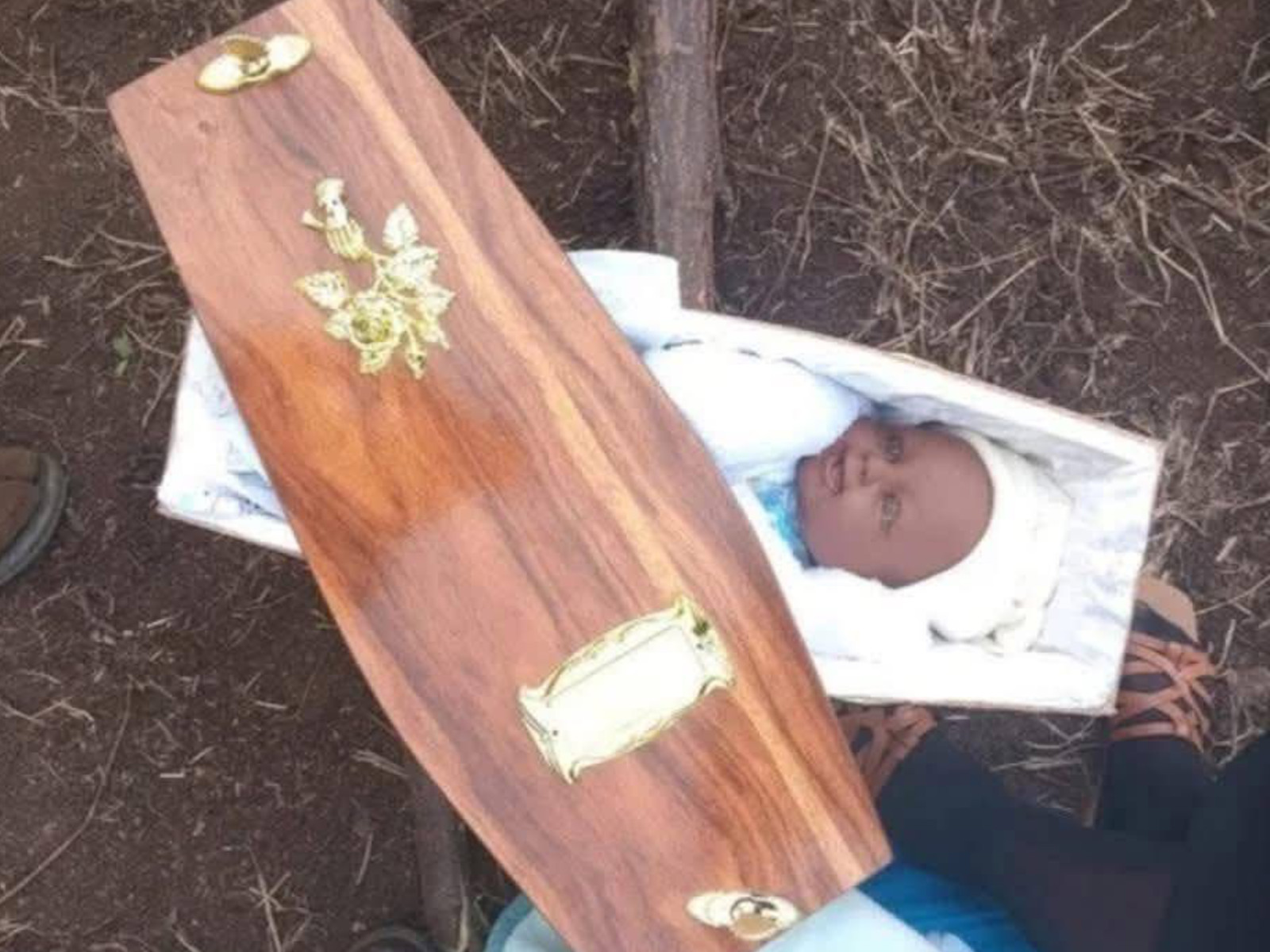 Man discovers 'dead baby' is actually a doll at funeral service ...
